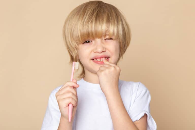 Why do kids get silver teeth? - Kakar Dental Group
